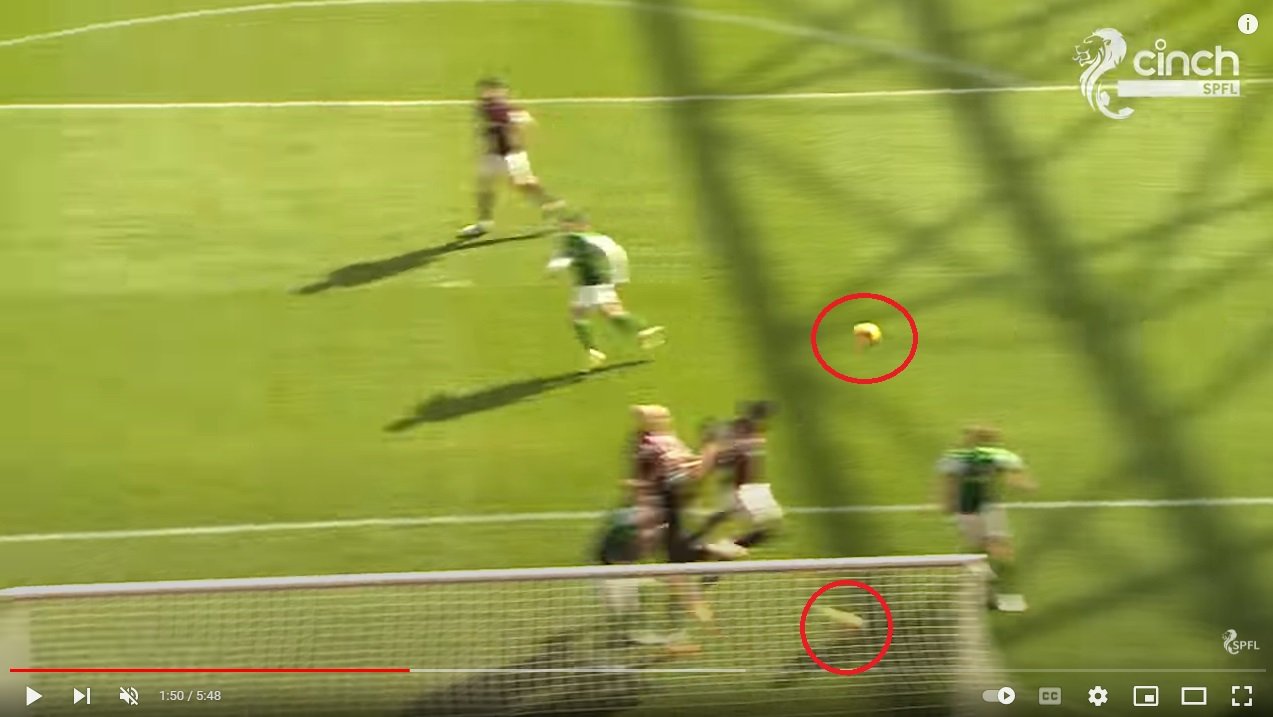 Two balls on the pitch.... one ended up in the net. Weird Hibs fan ...